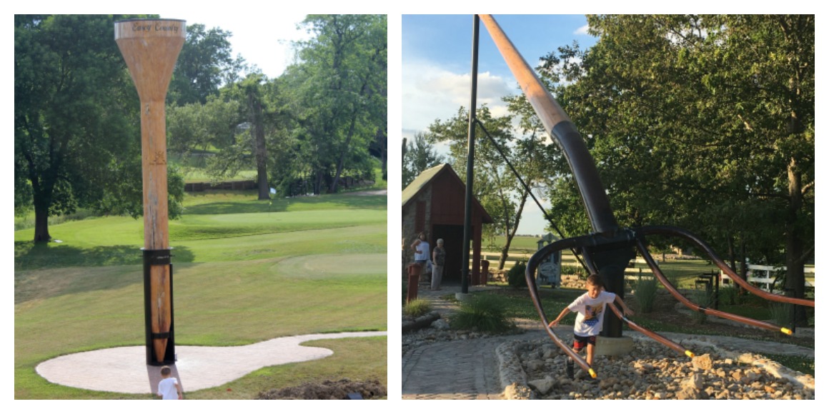 Worlds largest golf tee and pitch fork - Well Traveled Kids